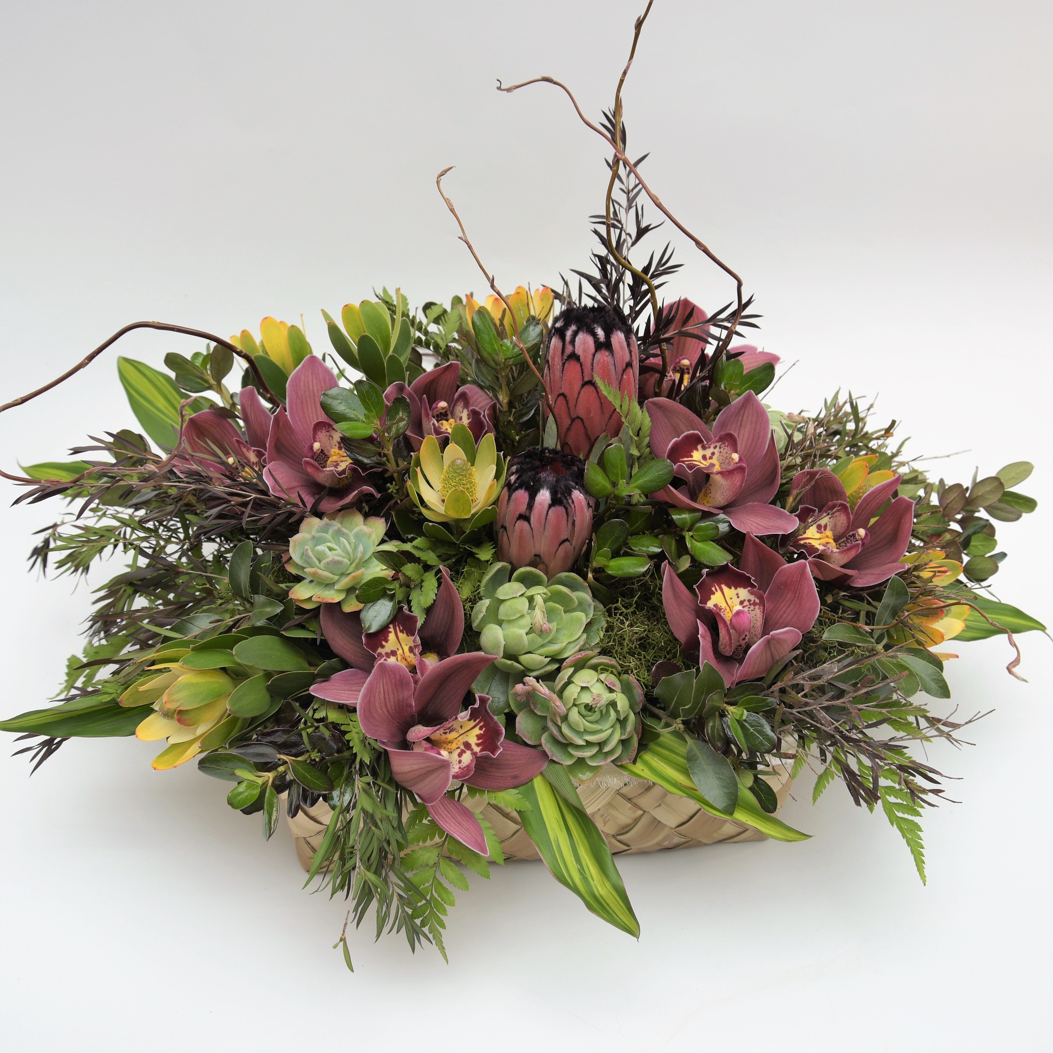 Flax boxes and Basket Arrangements – Flowers By Tanya